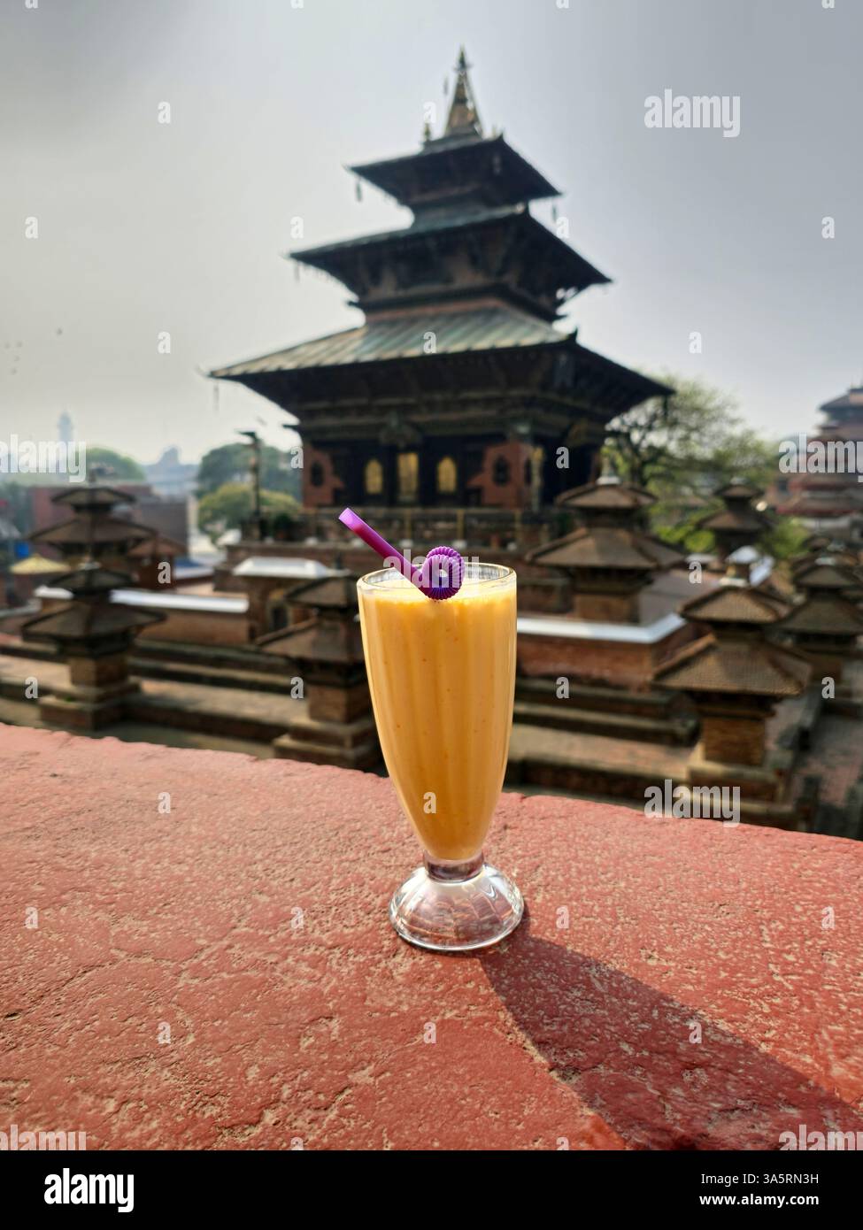 A glass of cold Mango Lassi at a cafe in the Durbar Square in Kathmandu ...