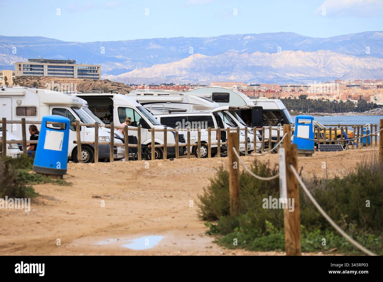 Urbanova, Alicante, Spain- March 15, 2025: Caravans parked on the shore ...
