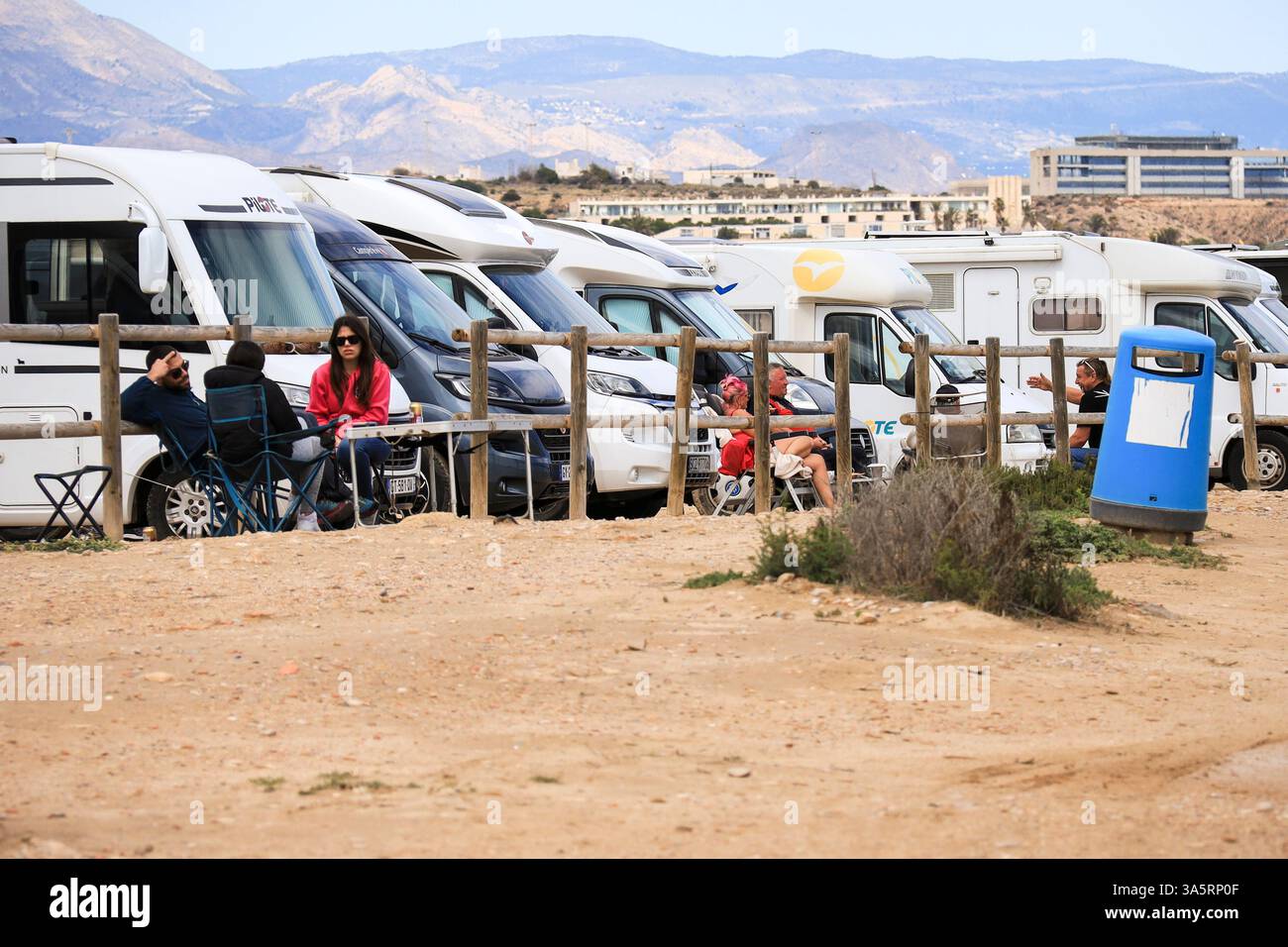Urbanova, Alicante, Spain- March 15, 2025: Caravans parked on the shore ...