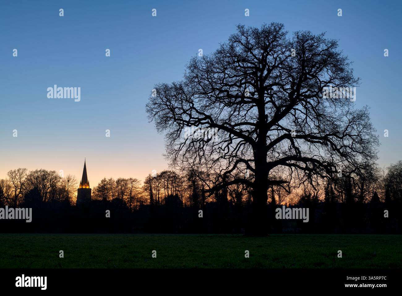 St Marys Church at dusk in Adderbury, Oxfordshire, England. Silhouette ...