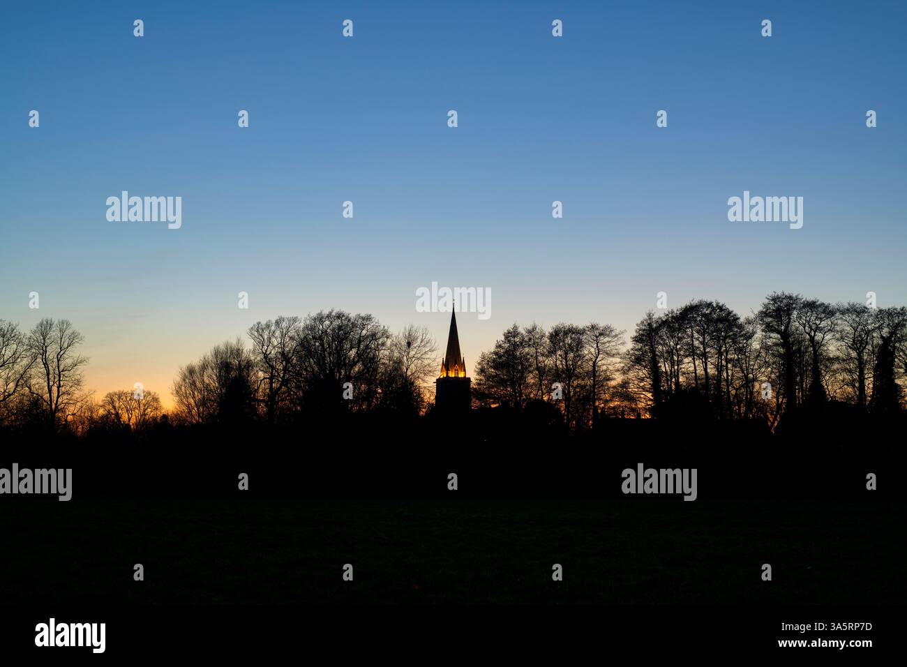 St Marys Church at dusk in Adderbury, Oxfordshire, England. Silhouette ...