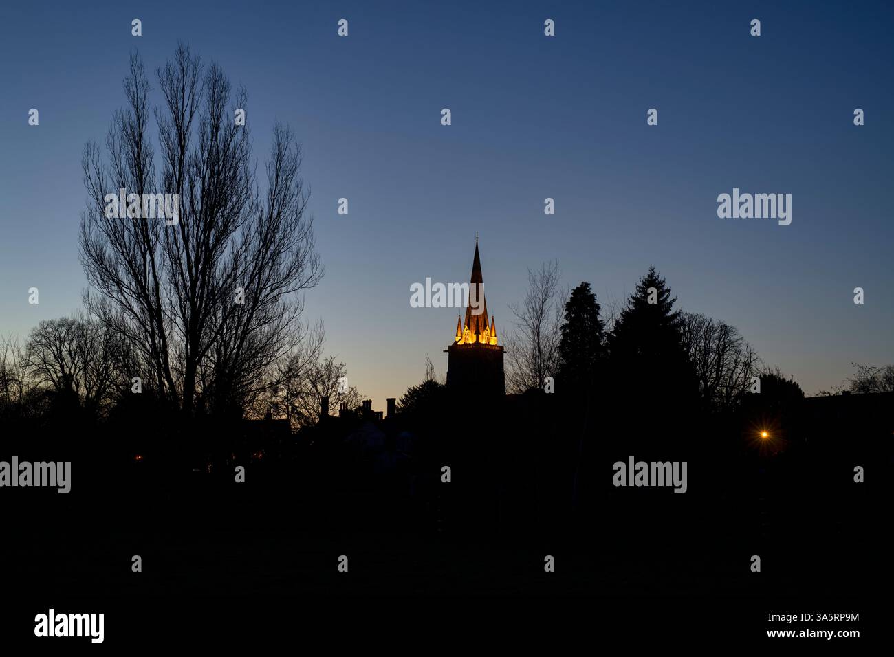 St Marys Church at dusk in Adderbury, Oxfordshire, England. Silhouette ...