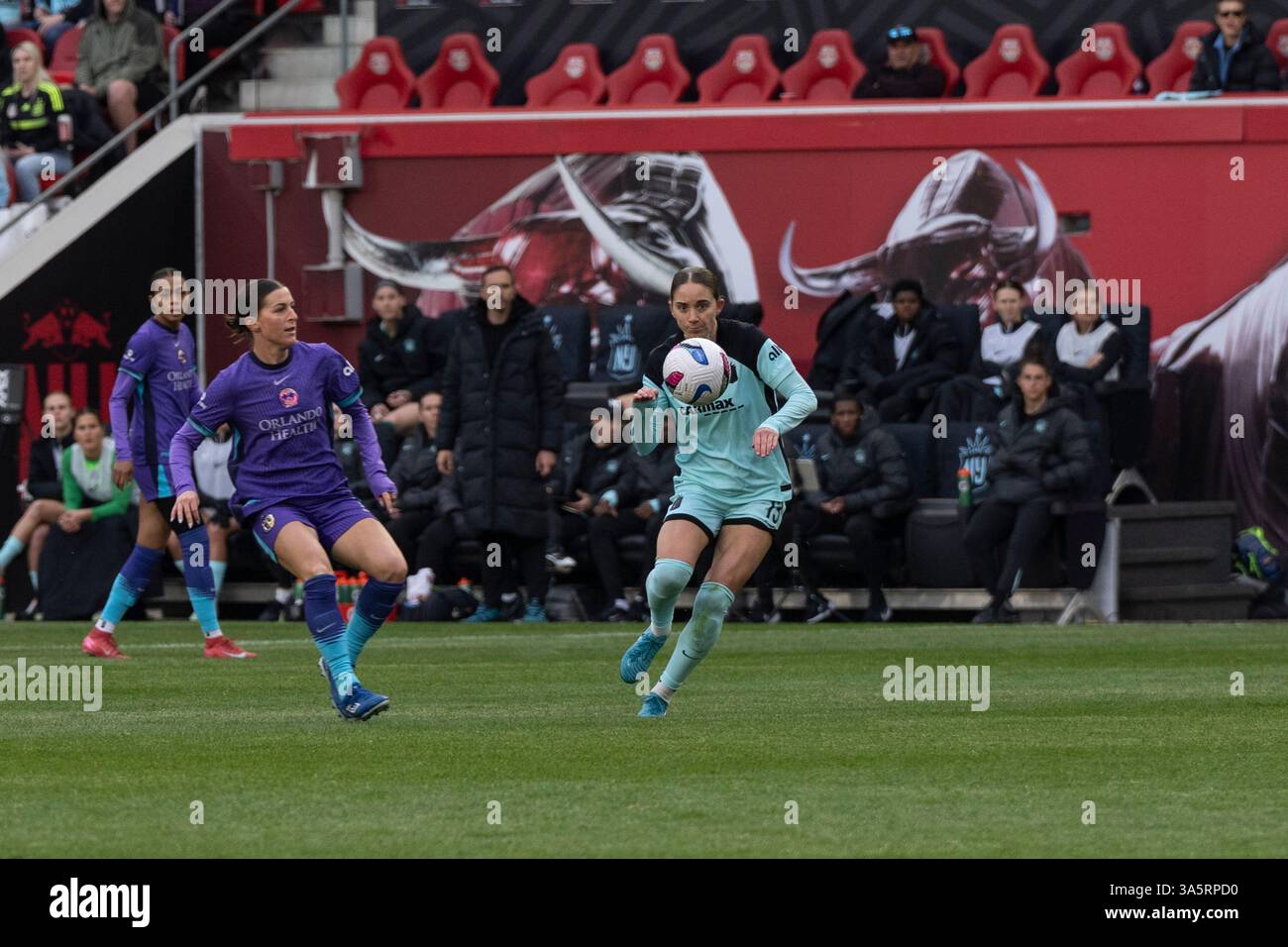 Harrison, USA. 23rd Mar, 2025. Ella Stevens (13) of Gotham FC control ...