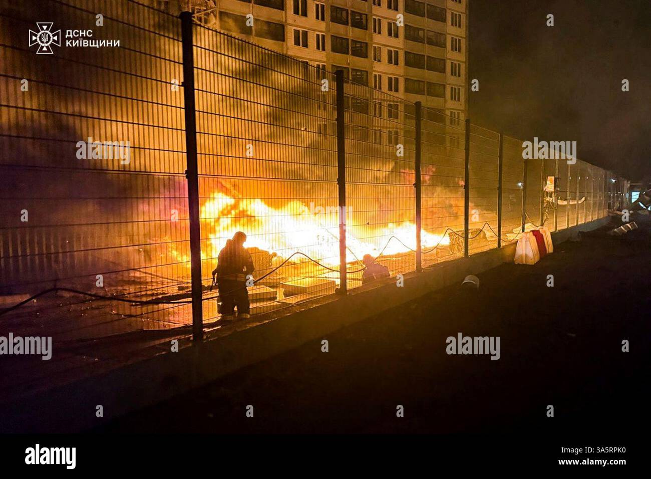 In this photo provided by the Ukrainian Emergency Service, firefighters ...