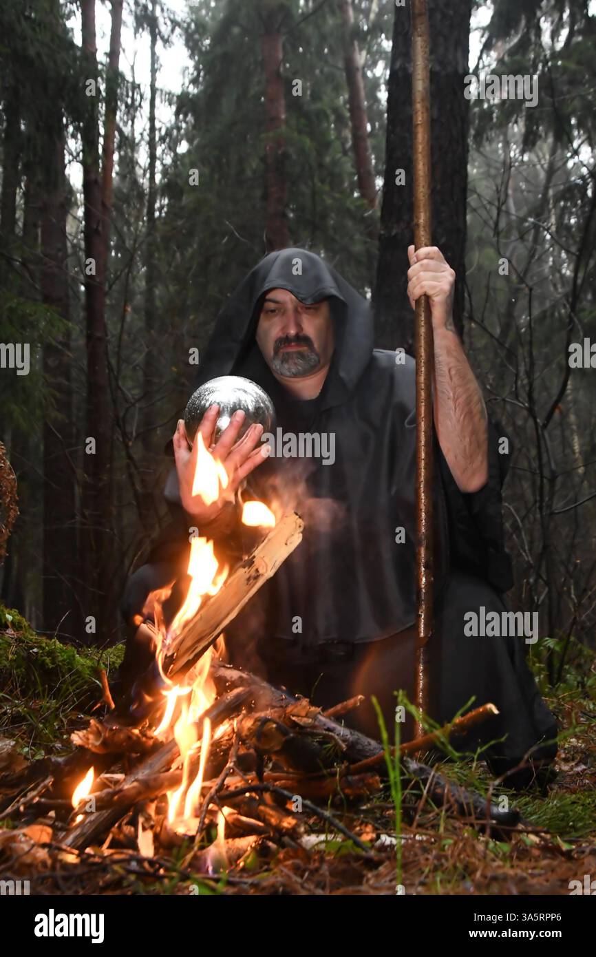 Man warms hands wanderer in hi-res stock photography and images - Alamy