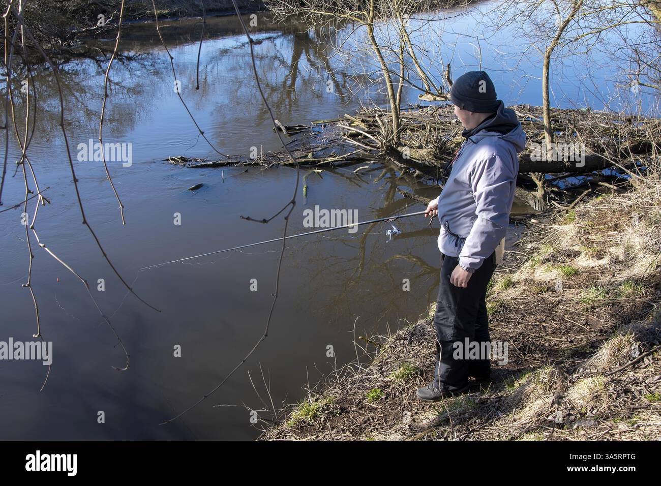Man casting fishing rod first hi-res stock photography and images - Alamy