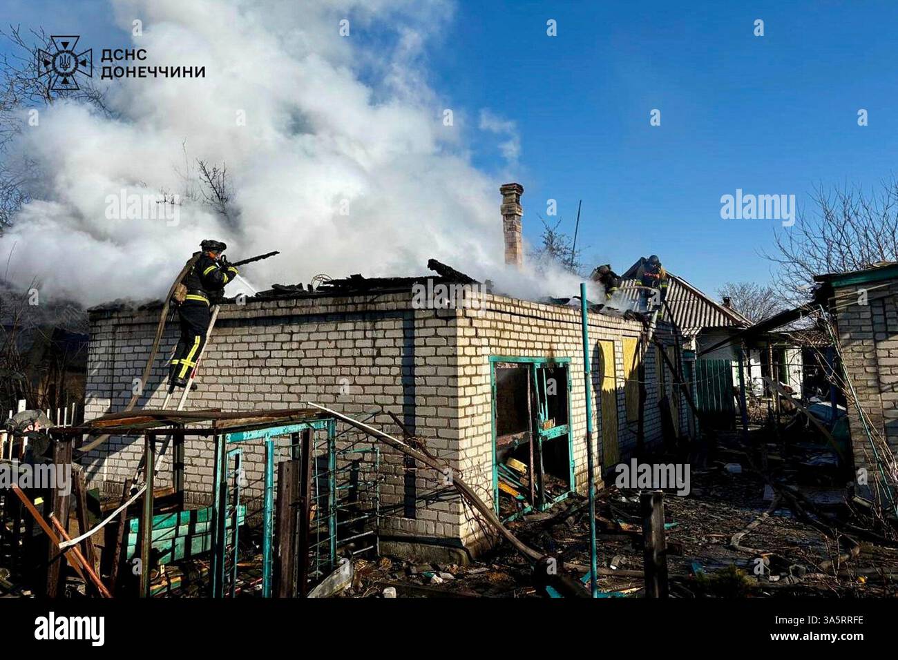 In this photo provided by the Ukrainian Emergency Service, firefighters ...