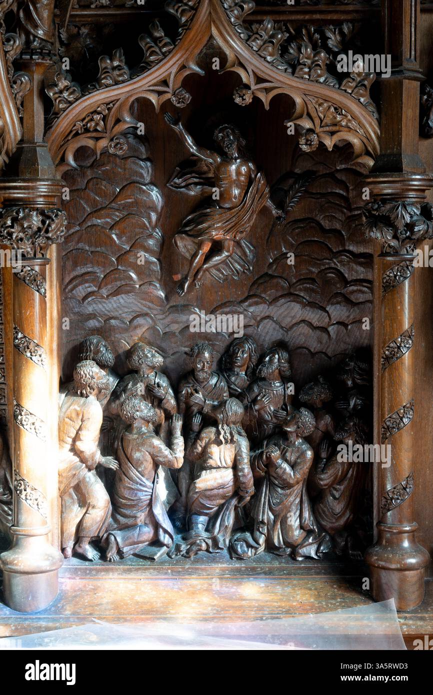 Carved wooden reredos, St. Mary`s Church, Clipsham, Rutland, England ...