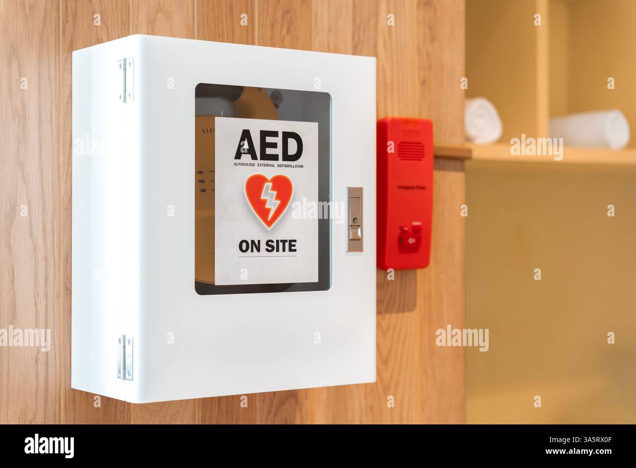 General view of a life saving defibrillator. Portable automated ...