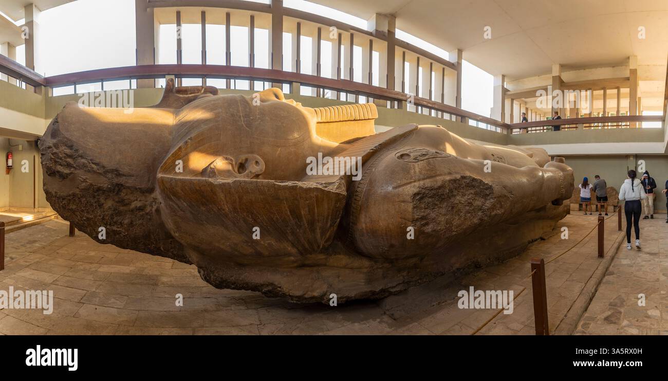 Memphis, Egypt; January 20, 2024: Witness the grandeur of the Ramses II Colossus, an alabaster ...