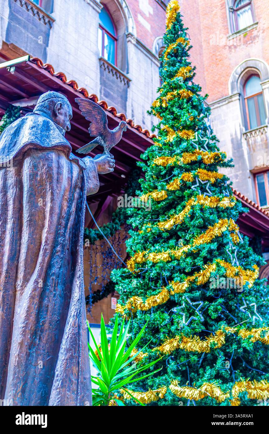 The statue of Pope John XXIII in the garden of the Church of St Anthony ...