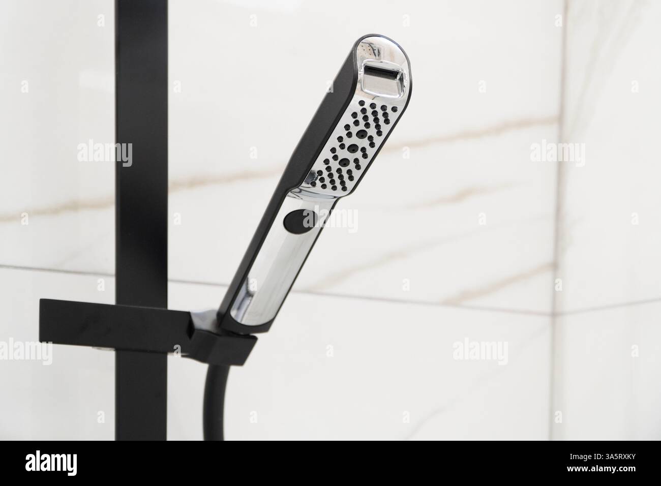 Modern water saving shower in a minimalist bathroom Stock Photo - Alamy