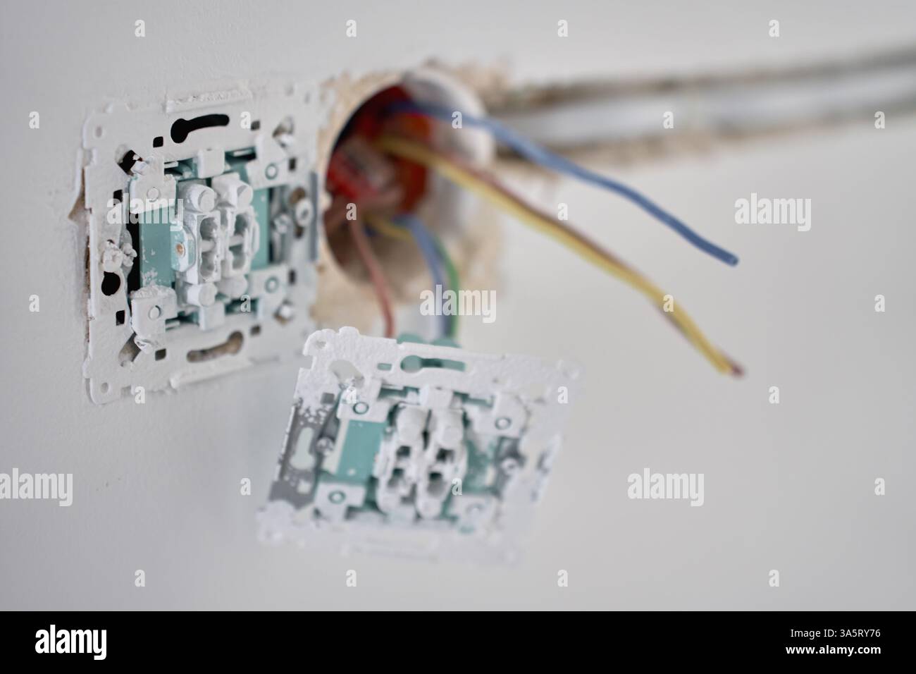 Light switch installation during renovation. Electrical switches with ...