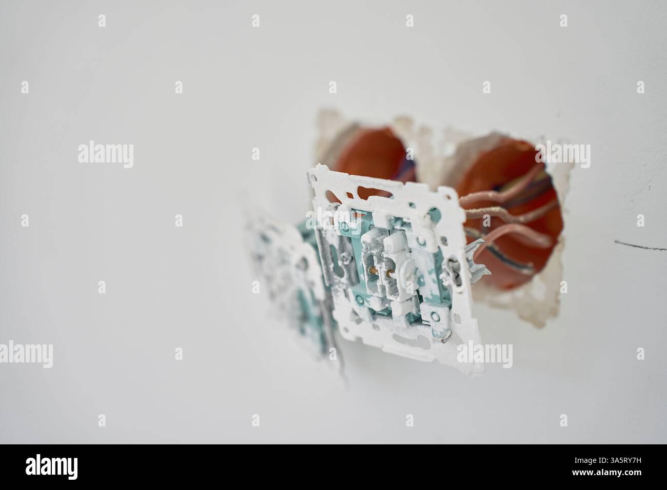 Light switch installation during renovation. Electrical switches with ...