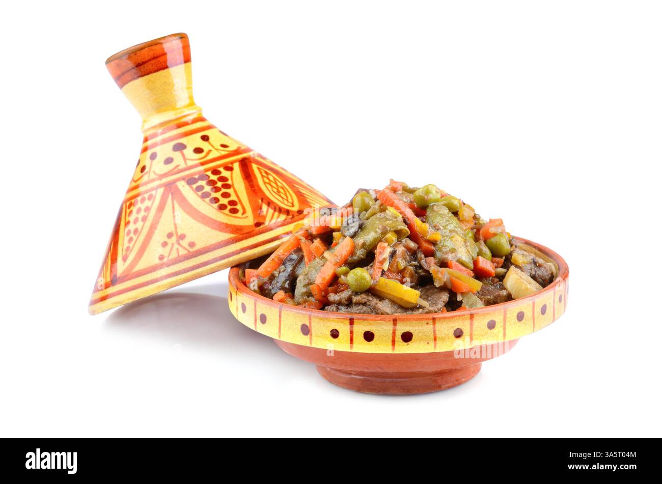 Tajine, Moroccan national dish with meat and vegetables on a white ...