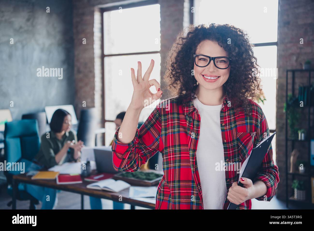 Young students working collaboratively on hi-res stock photography and ...