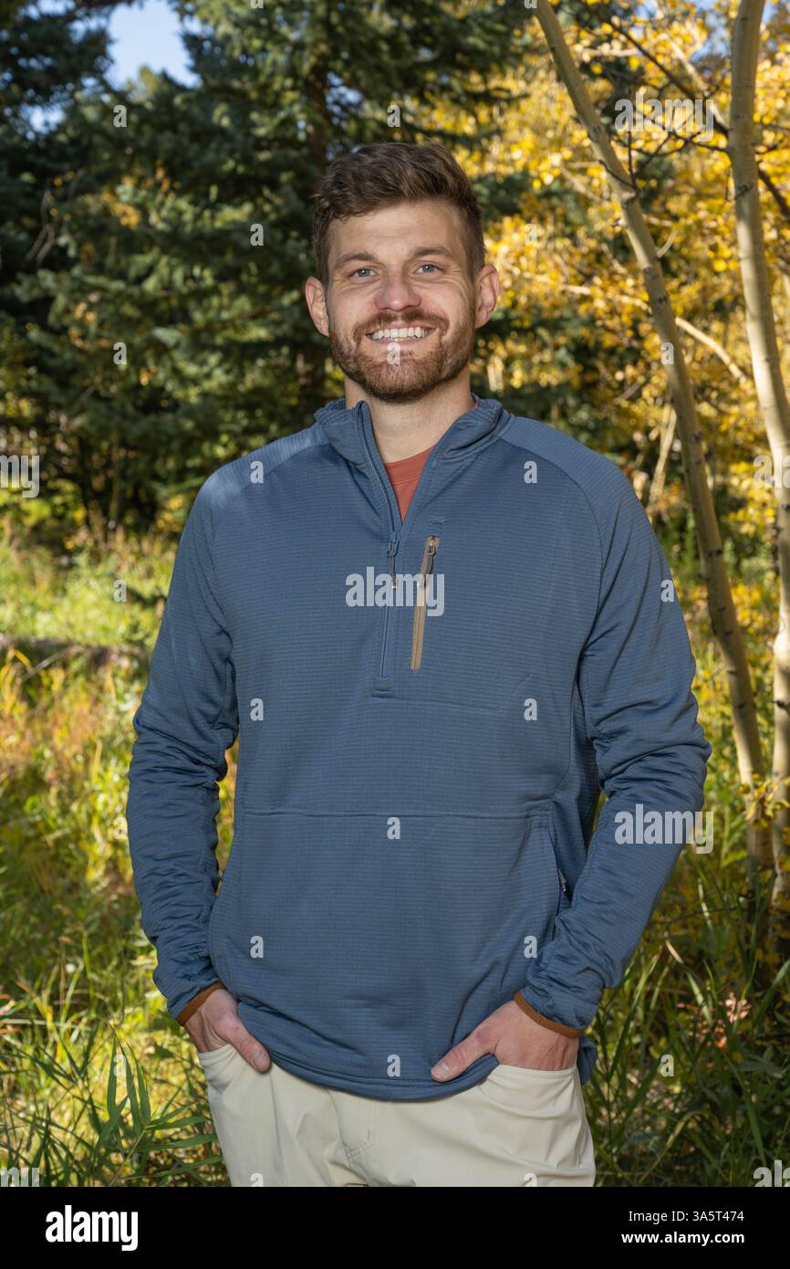 Man Models clothing in the Colorado Fall Stock Photo - Alamy