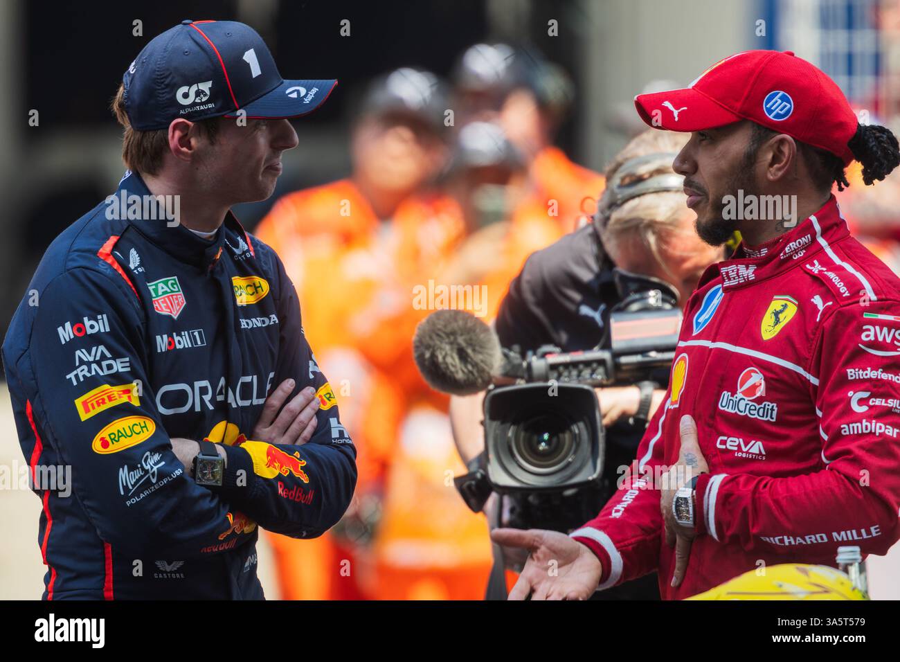 Shanghai, China. 22nd Mar, 2025. Lewis Hamilton and Max Verstappen seen ...
