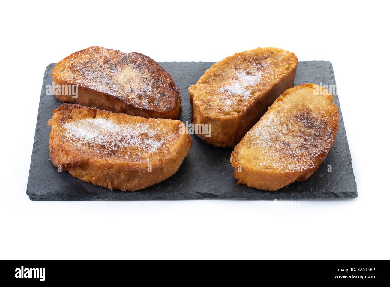 Traditional Spanish torrijas for Holy Week isolated on white background ...