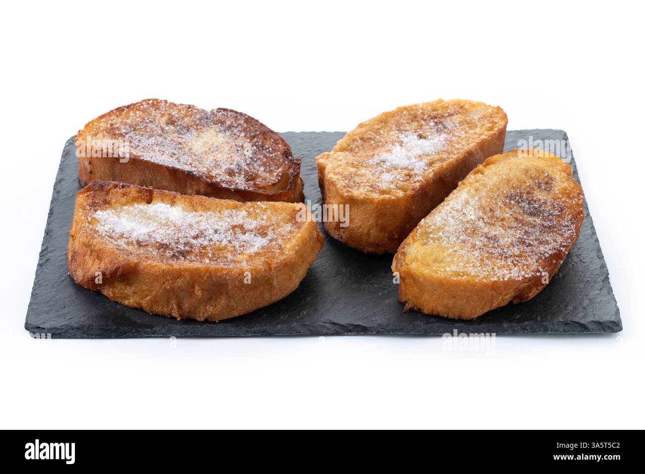 Traditional Spanish torrijas for Holy Week isolated on white background ...