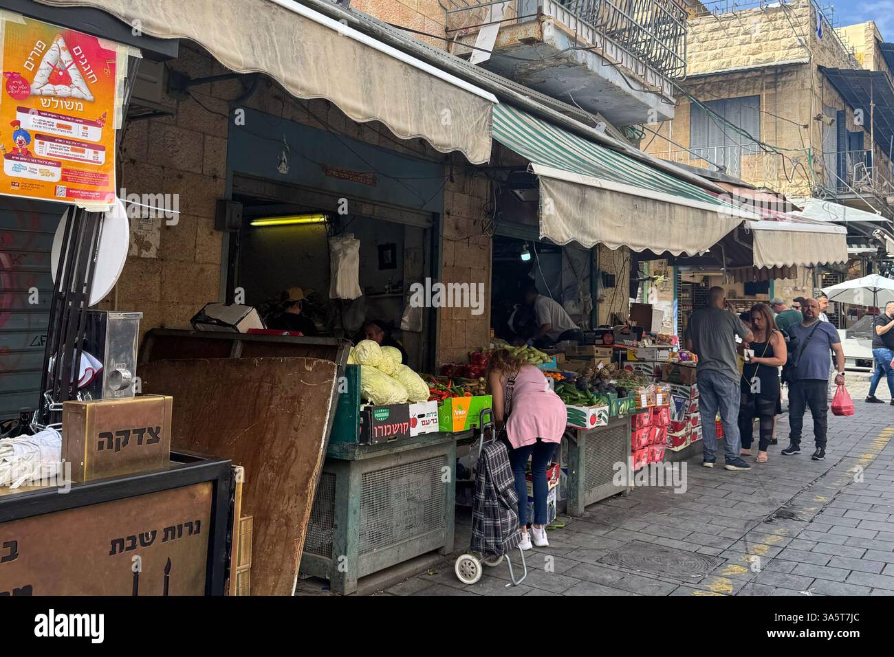 Jerusalem, Israel. 17th Mar, 2025. A shopping street is seen in central ...