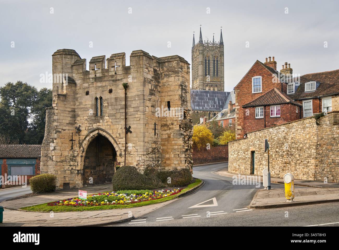 A historic view of Pottergate Arch in Lincoln, England, a medieval ...