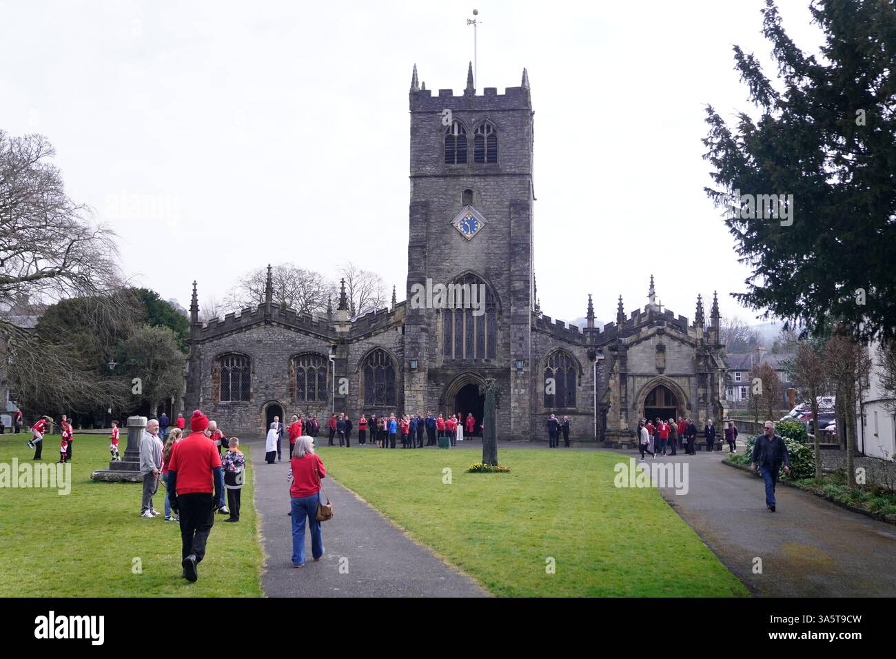 Mourners gather outside Kendal Parish Church ahead of the funeral for ...