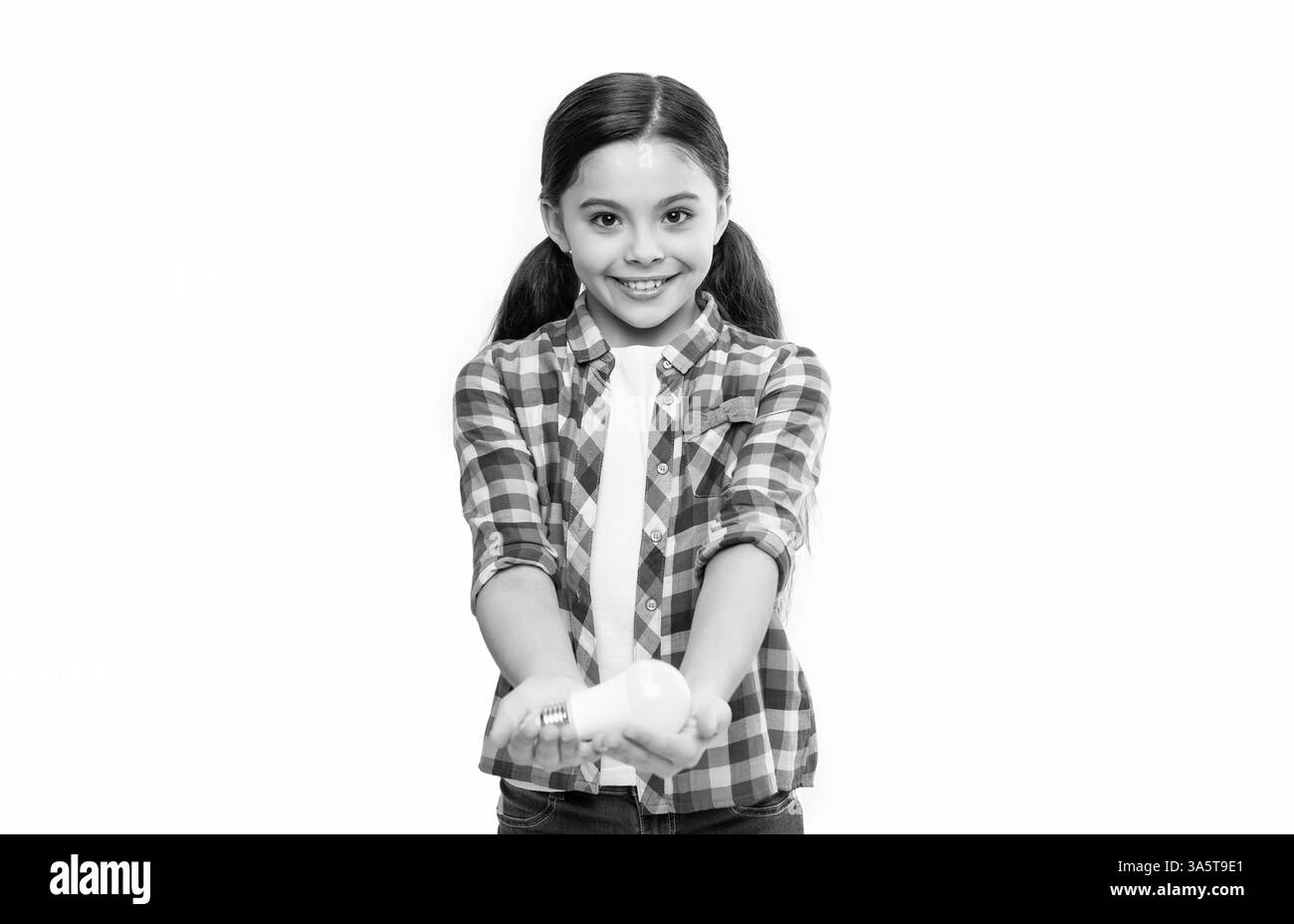 teen genius girl on background. photo of teen genius girl with bulb ...