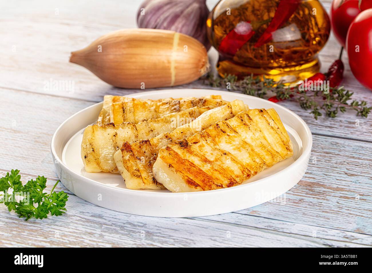 Greek traditional grilled halloumi cheese snack Stock Photo - Alamy
