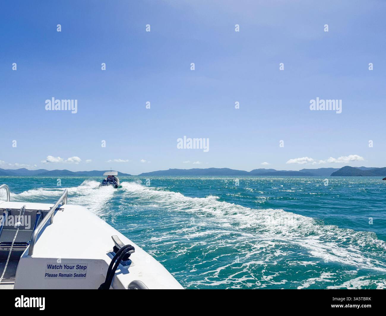 Boat on wheels standing at unique famous Whitehaven Beach. Modern ...
