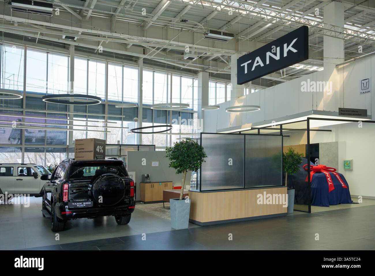 Almaty, Kazakhstan - March 13, 2025: Tank sign in the showroom. Chinese ...