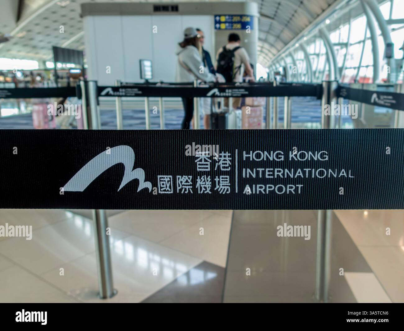 Hong Kong, China. 23rd Mar, 2025. The logo and name of Hong Kong International Airport are seen ...