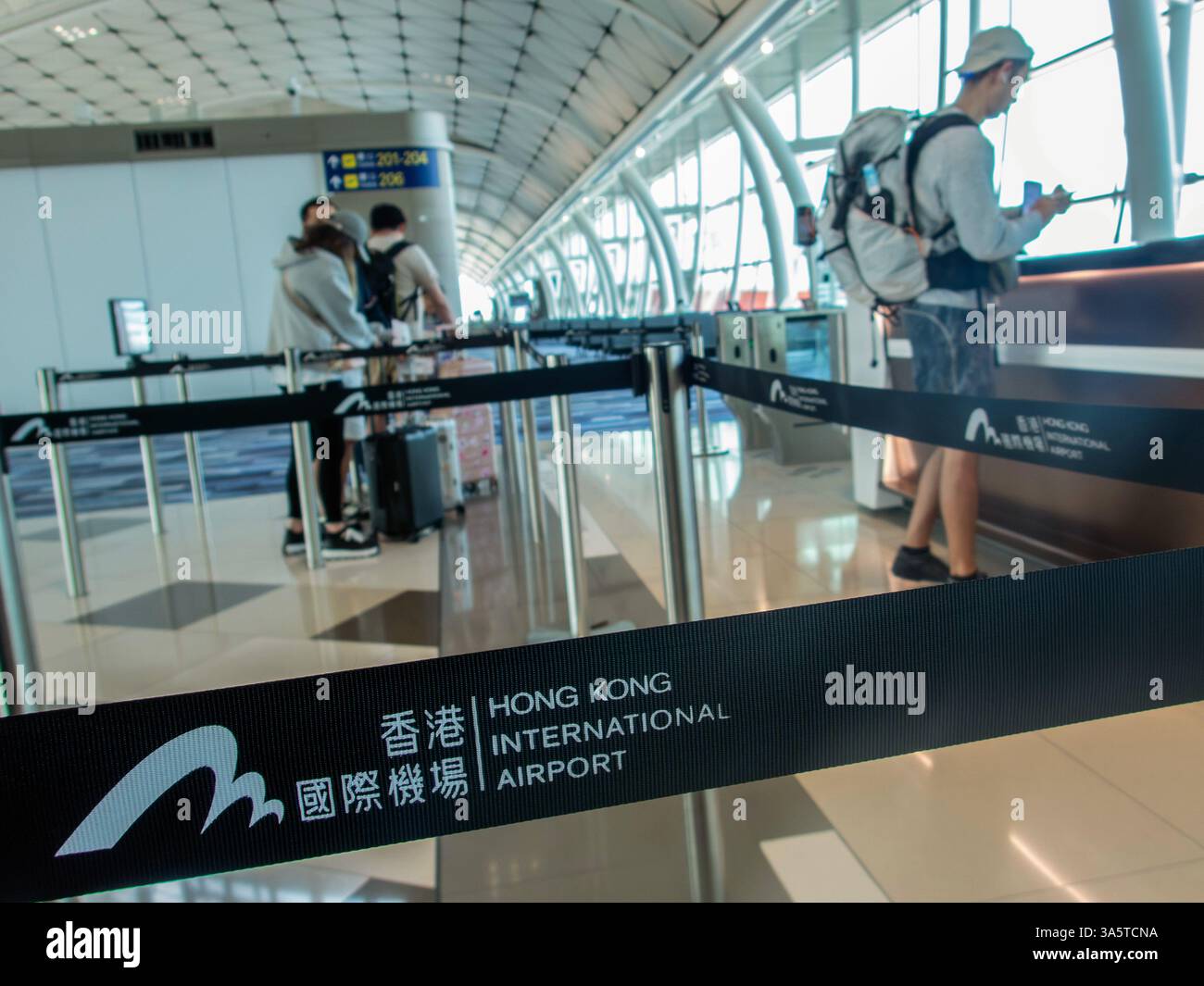 Hong Kong, China. 23rd Mar, 2025. The logo and name of Hong Kong International Airport are seen ...