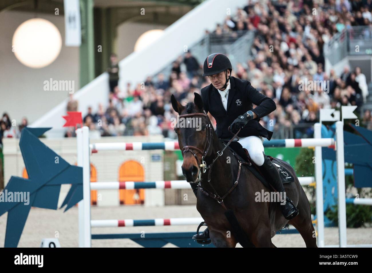 Andreas SCHOU of Denmark with Darc de lux during the Grand Prix Hermès at the Saut Hermès on ...