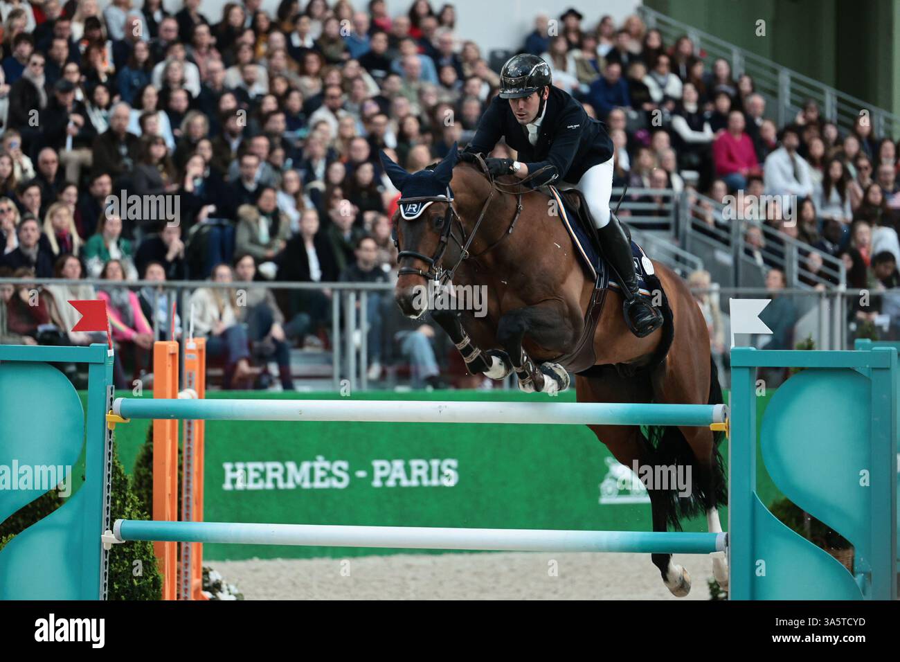 Paris, France. 23rd Mar, 2025. Nathan BUDD of Belgium with Touardo blue ...