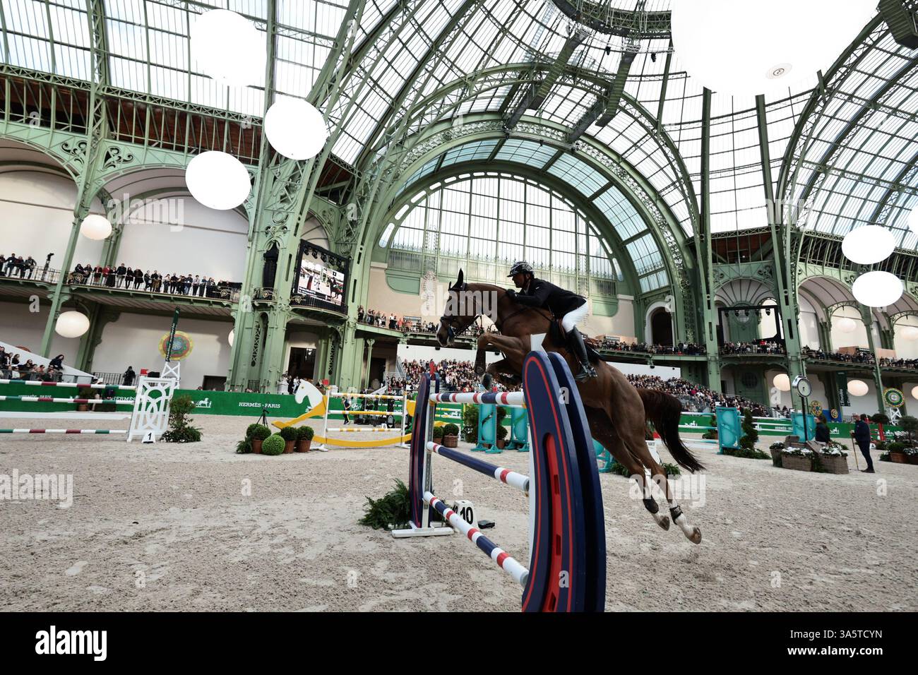 Paris, France. 23rd Mar, 2025. Nicolas DELMOTTE of France with Girl ...
