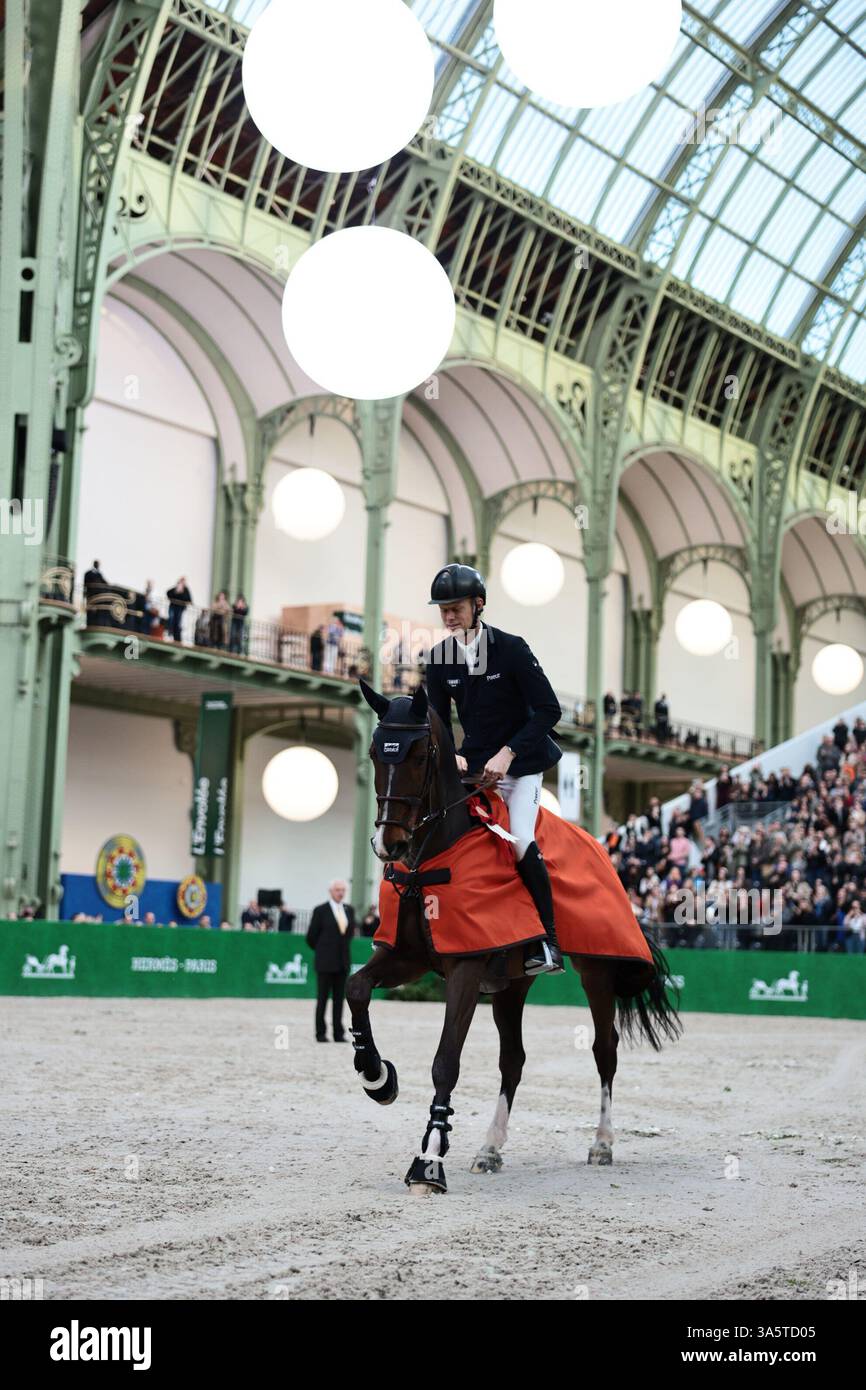 Paris, France. 23rd Mar, 2025. Max KÜHNER of Austria with Eic julius ...