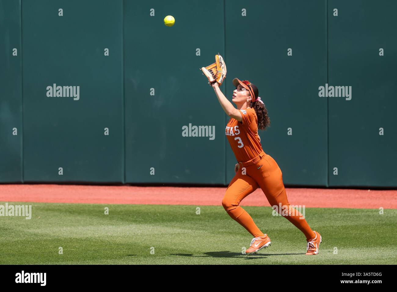 AUSTIN, TX - MARCH 22: Texas utility Vanessa Quiroga (3) warms up in the outfield before the SEC ...