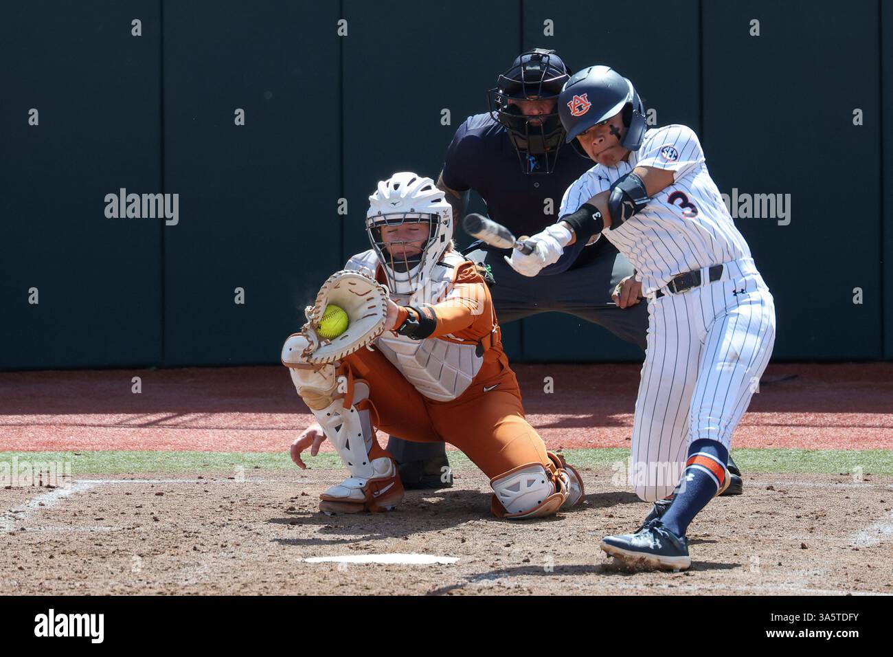AUSTIN, TX - MARCH 22: Texas utility Reese Atwood (14) catches a pitch ...