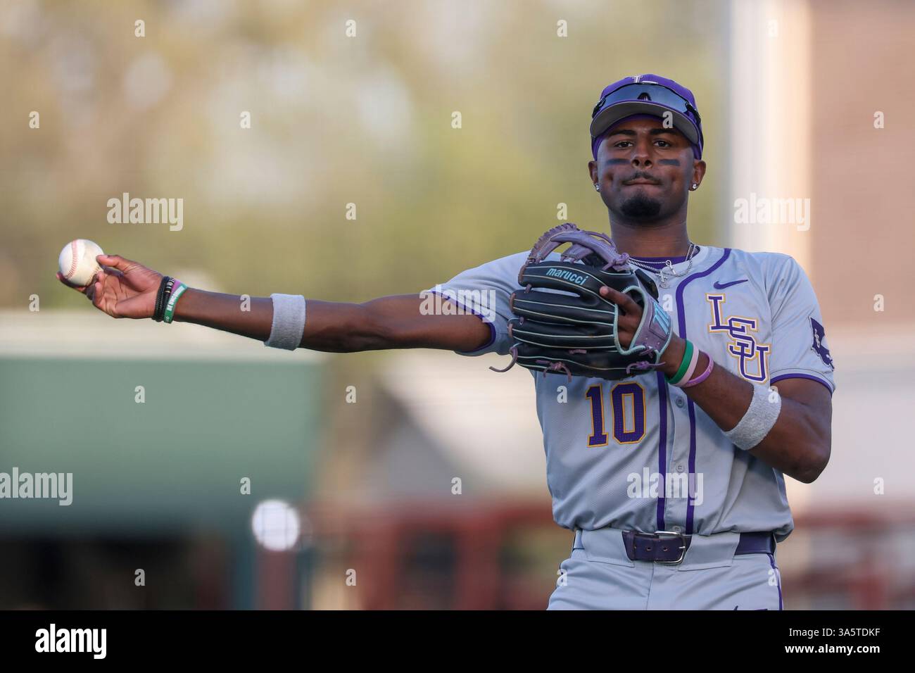 AUSTIN, TX - MARCH 22: LSU infielder Michael Braswell (10) tosses a ...