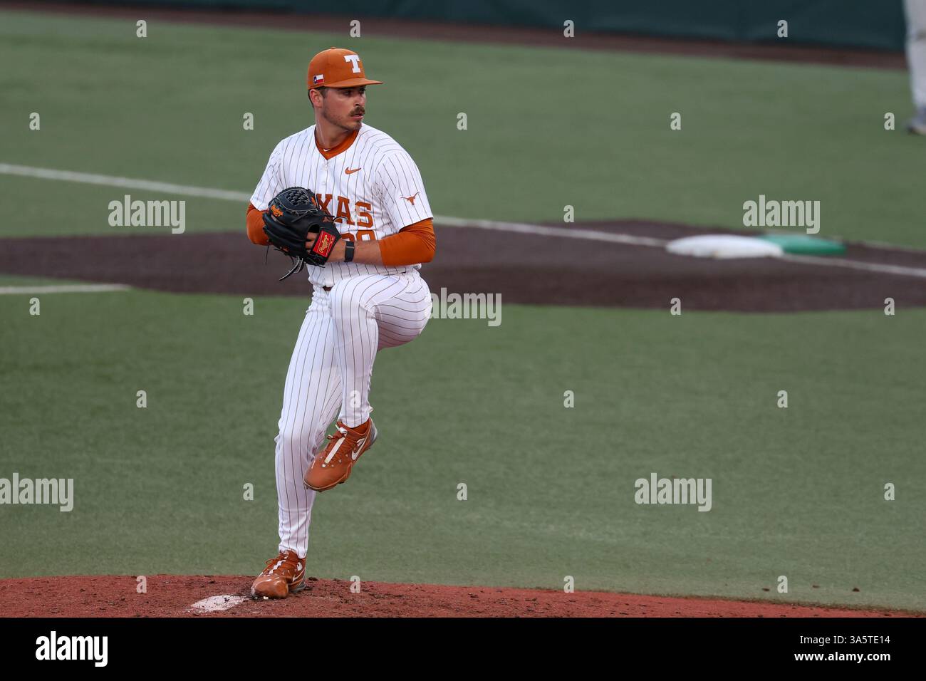 AUSTIN, TX - MARCH 22: Texas pitcher Max Grubbs (38) winds up to pitch ...