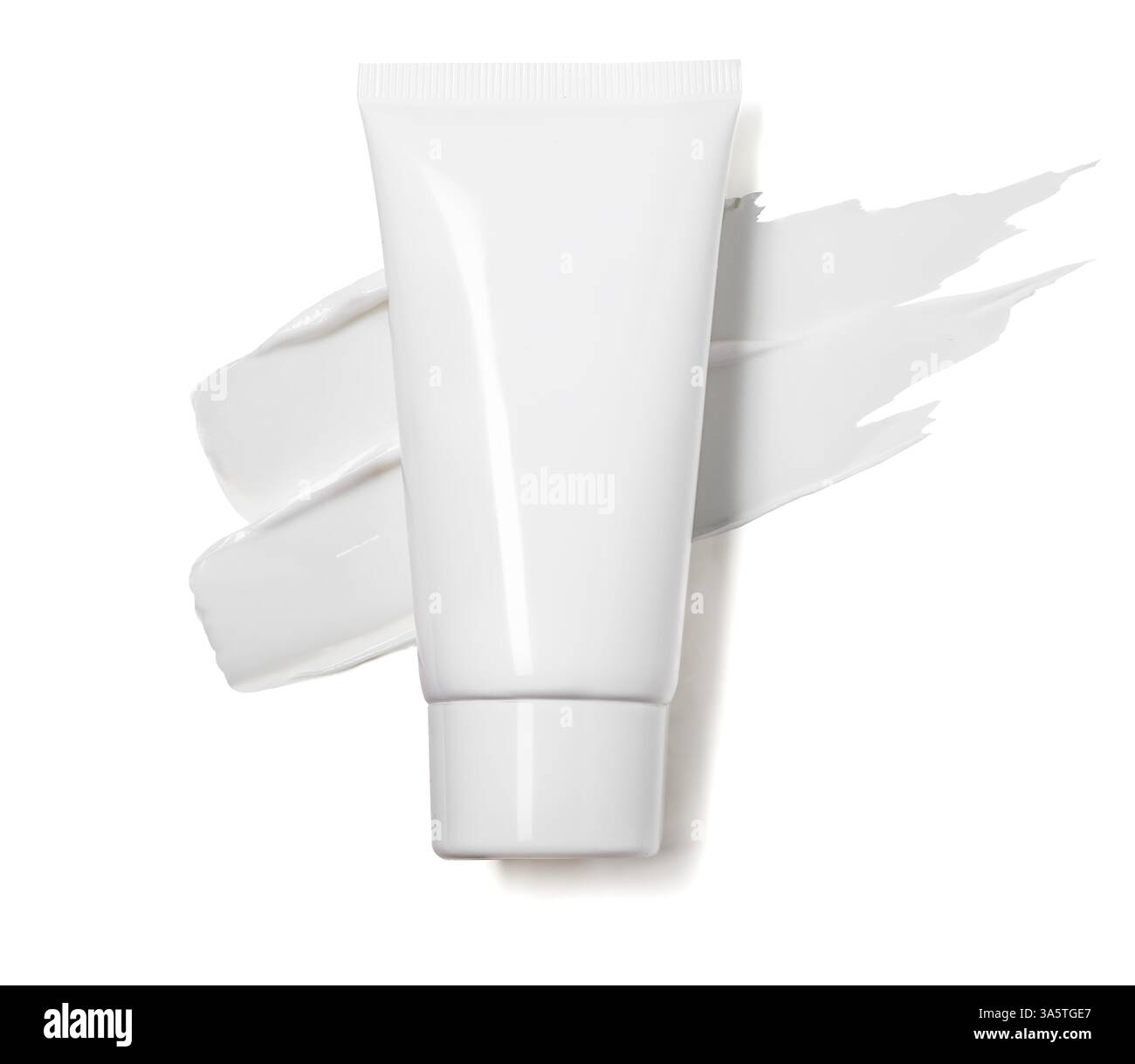 White cosmetic tube placed on an artistic background of a smear ...