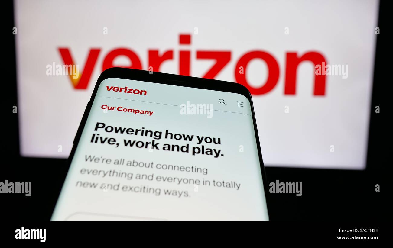 In this photo illustration, a smartphone with the website of US telecom ...