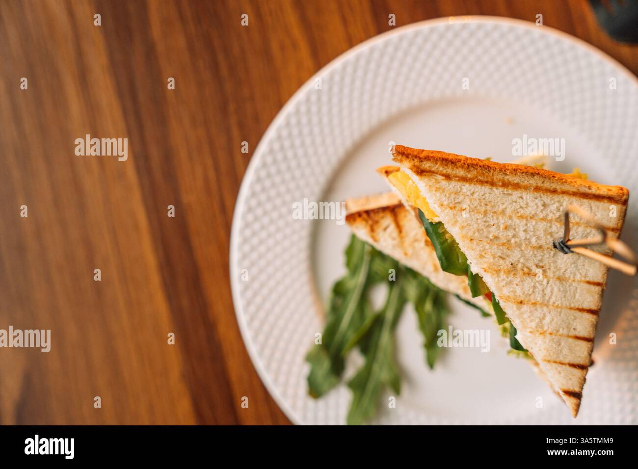 Grilled Ham and Tomato Triangle Sandwiches Stock Photo - Alamy