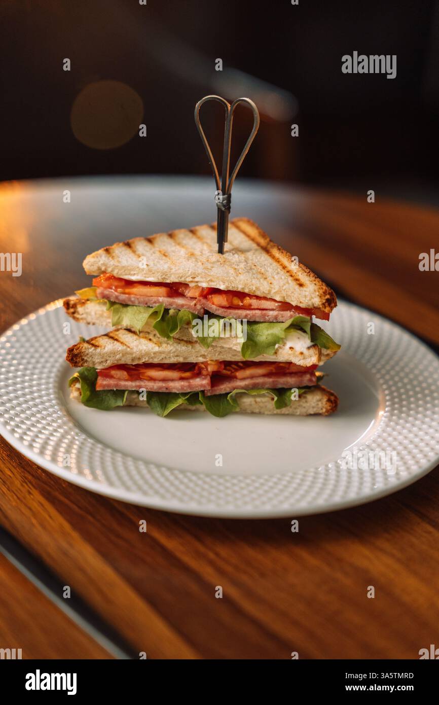 Grilled Ham and Tomato Triangle Sandwiches Stock Photo - Alamy