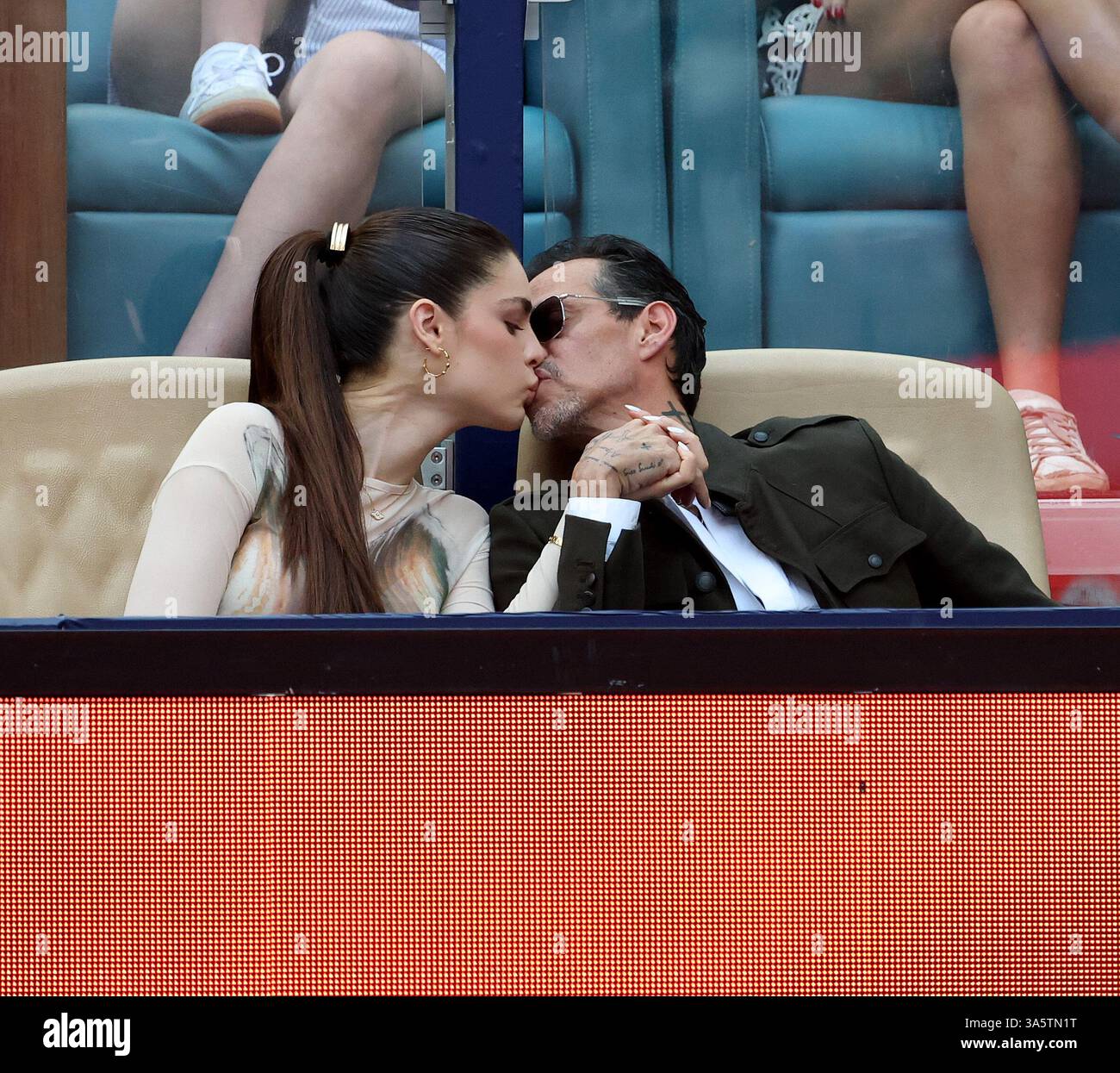 Miami Gardens, Florida, USA. 23rd Mar, 2025. Marc Anthony and his wife Nadia Ferreira attend the ...