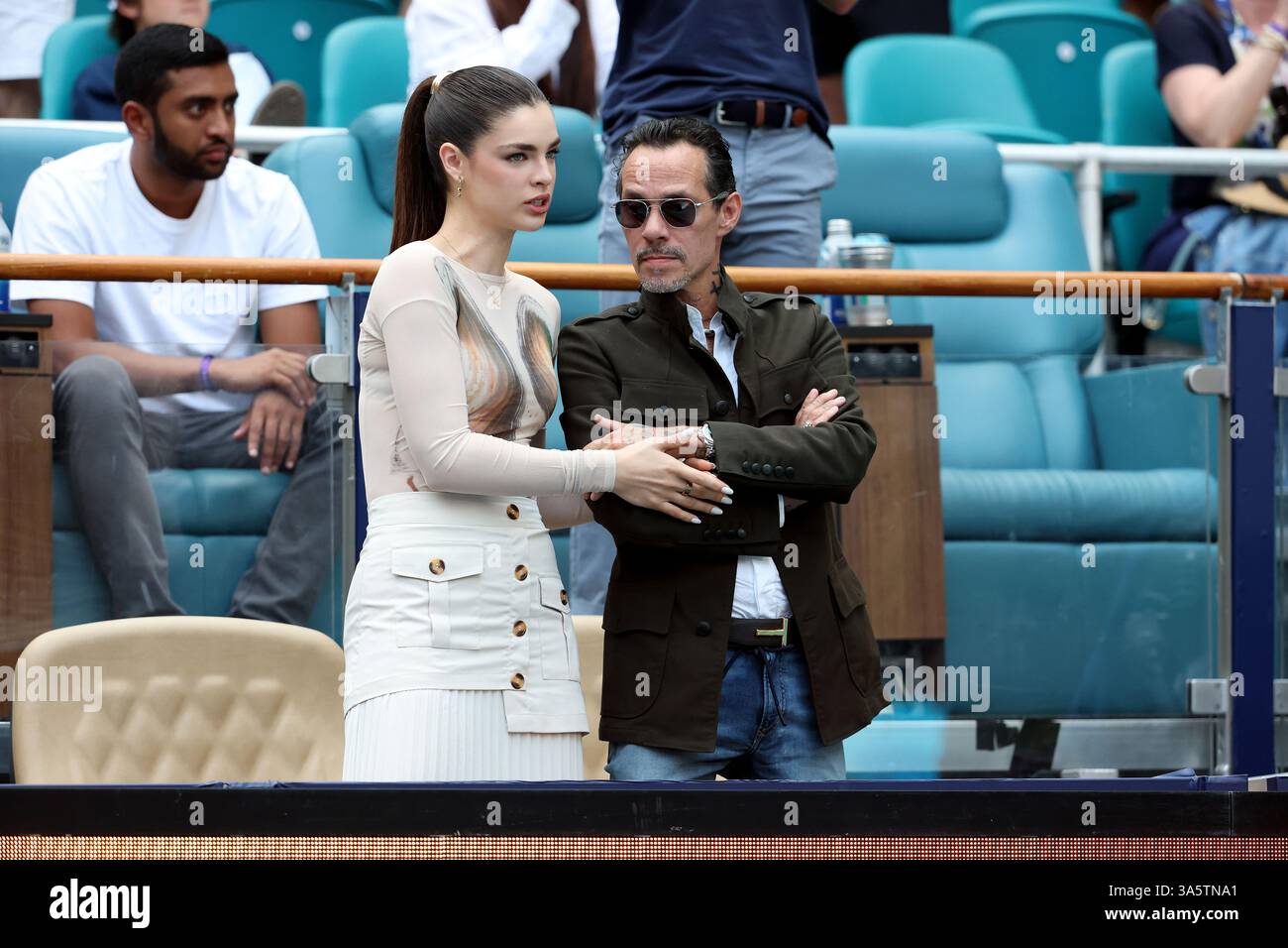 MIAMI GARDENS, FLORIDA - MARCH 23: Marc Anthony and his wife Nadia Ferreira attend the match ...