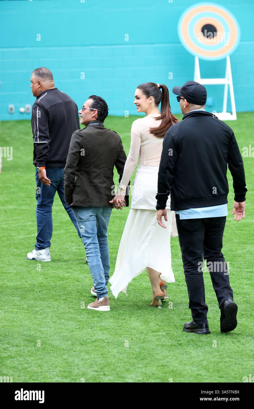 Miami Gardens, Florida, USA. 23rd Mar, 2025. Marc Anthony and his wife Nadia Ferreira attend the ...