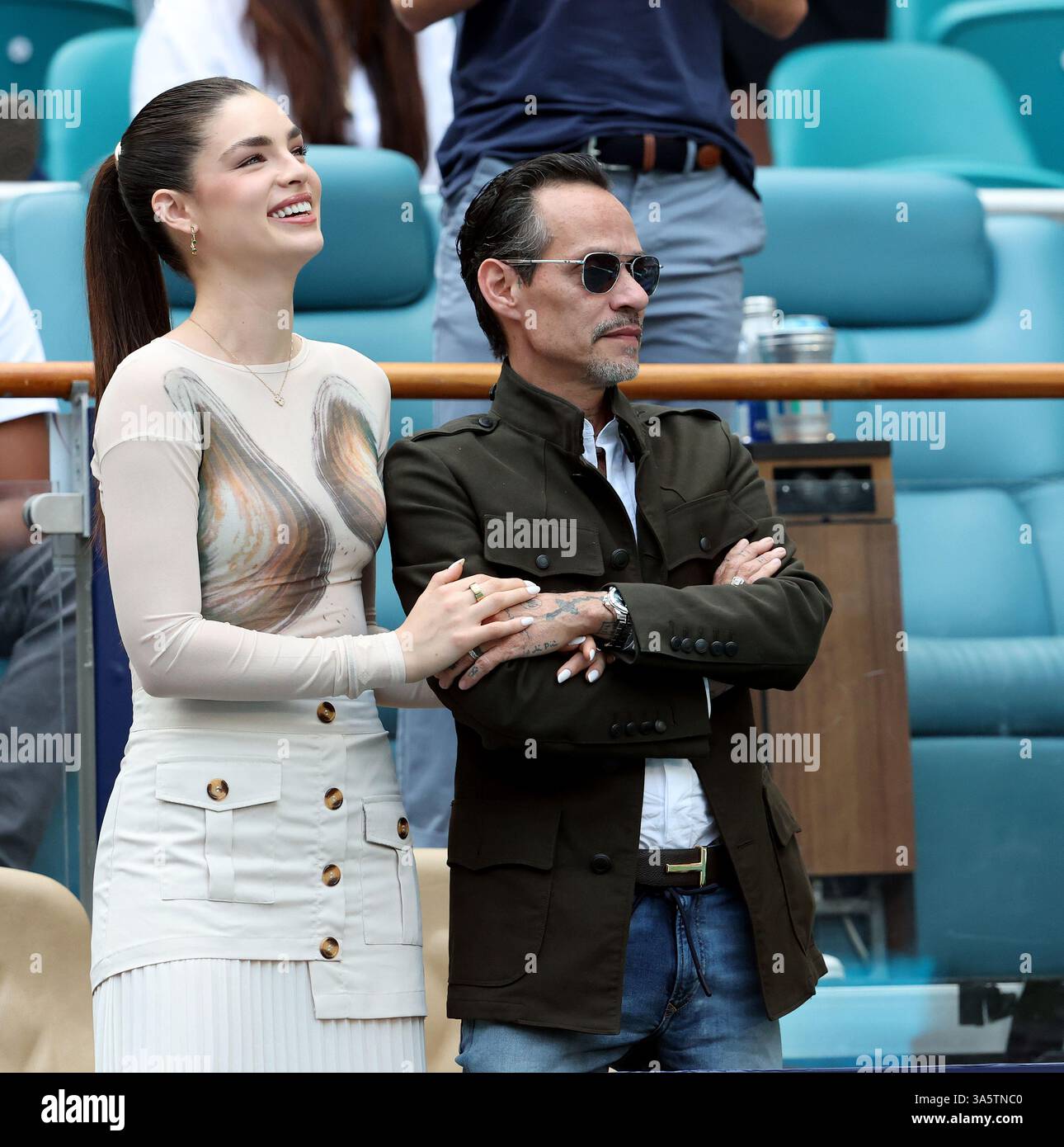 MIAMI GARDENS, FLORIDA - MARCH 23: Marc Anthony and his wife Nadia Ferreira attend the match ...