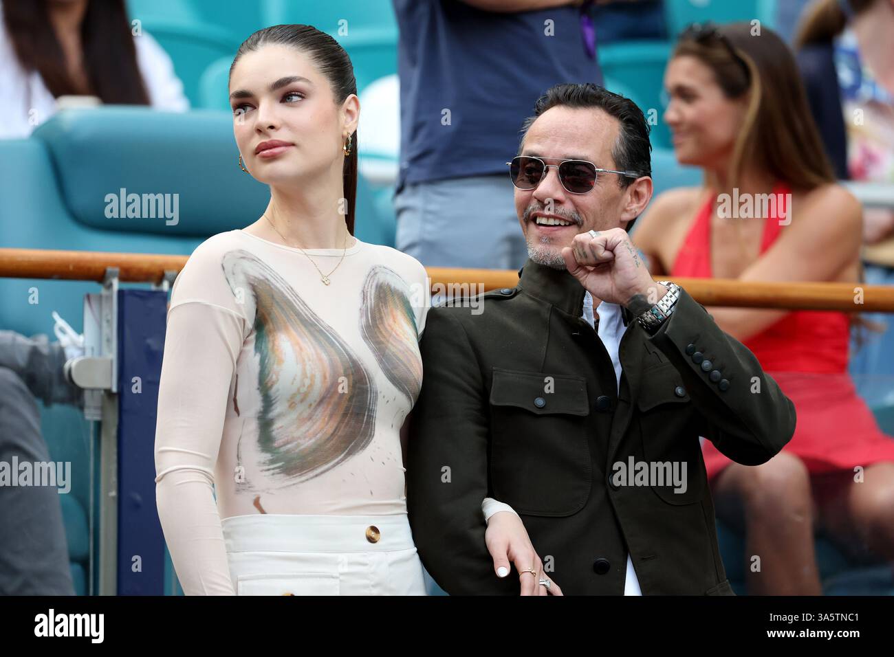 Miami Gardens, Florida, USA. 23rd Mar, 2025. Marc Anthony and his wife Nadia Ferreira attend the ...